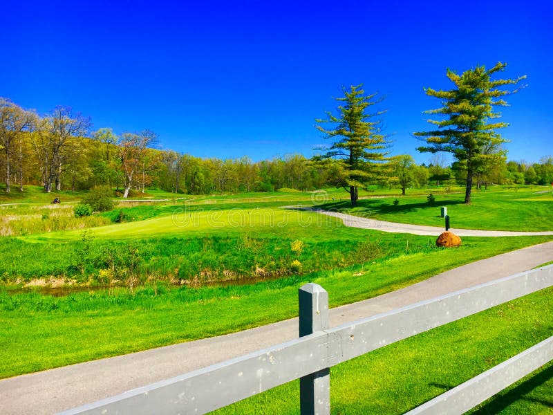Sunny Golf Course stock image. Image of expansive, picturesque - 73392287