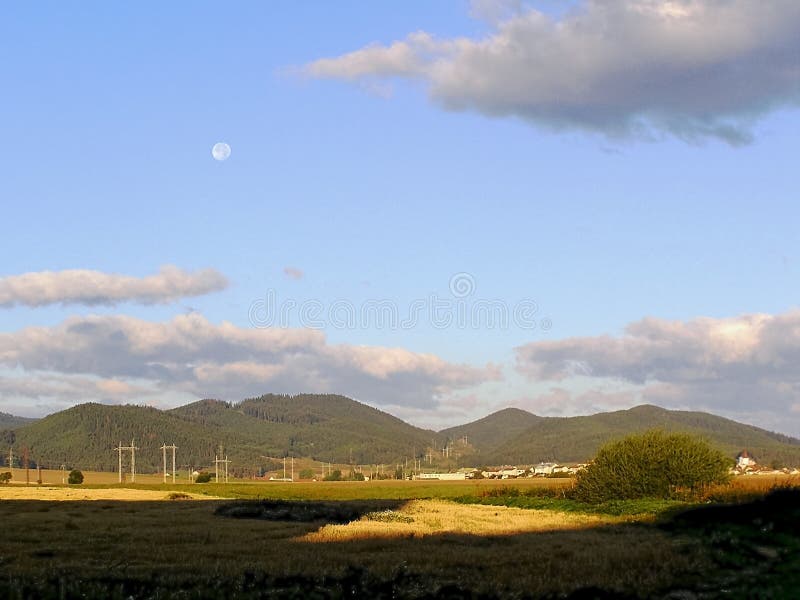 Sunny Landscape with a Full Moon in the Sky. Stock Photo - Image of ...