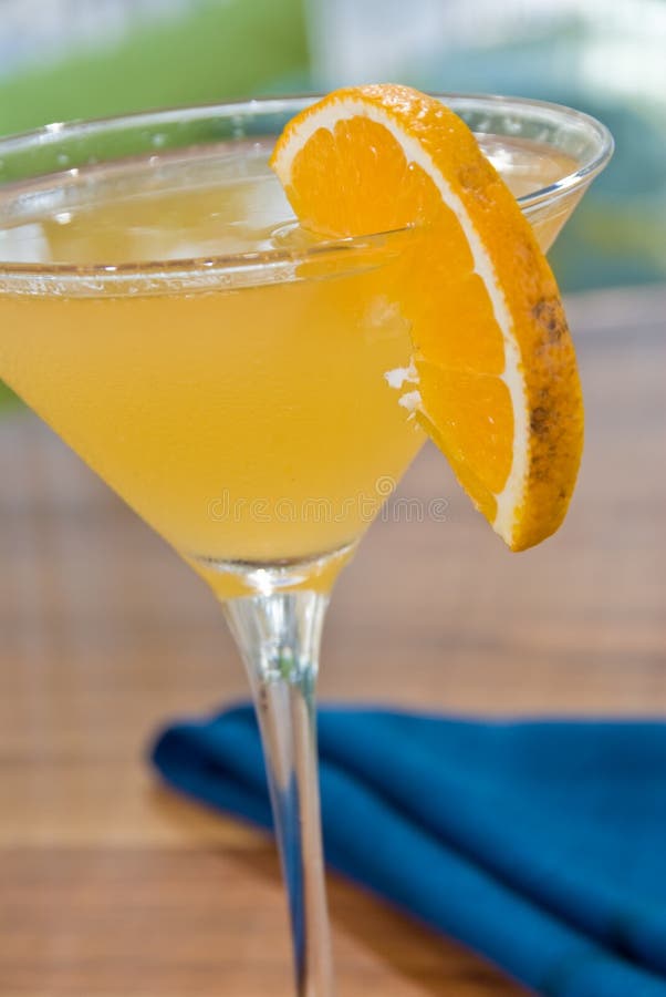 Sunny orange martini stock photo. Image of bright, table - 11217524