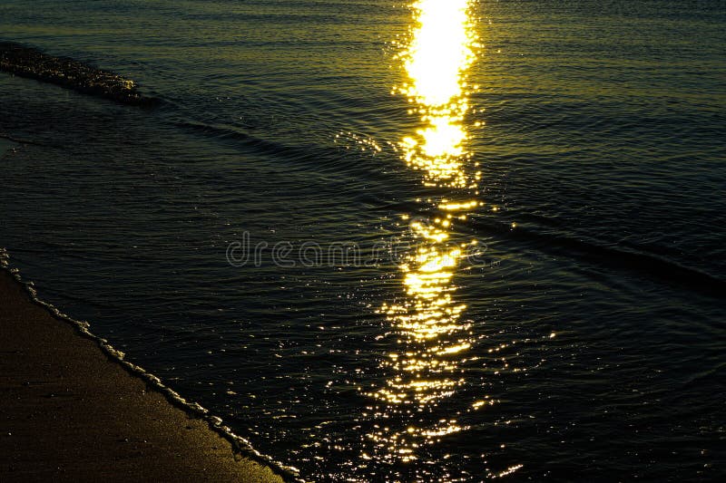 Sunny Path from the Setting Sun on Sea Water Stock Image - Image of ...