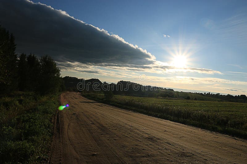 Sunny road field stock image. Image of landscape, field - 58770975