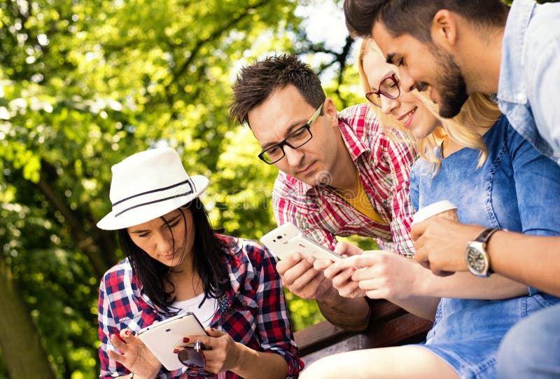 Sunny Scenery of a Group of Young Friends Having Fun in a Park Stock ...