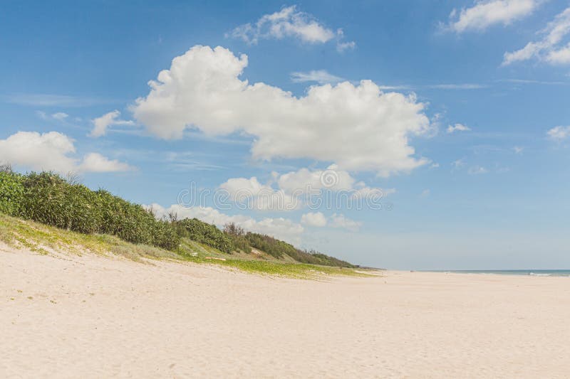 Sunny Seaside Scenery, Fine White Sand, Blue Sky and White Clouds Stock ...