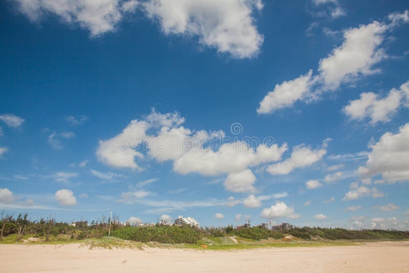 Sunny Seaside Scenery, Fine White Sand, Blue Sky and White Clouds Stock ...