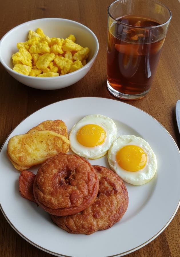 Sunny Side Up Eggs with Toast and Scrambled Eggs Breakfast Stock Photo ...