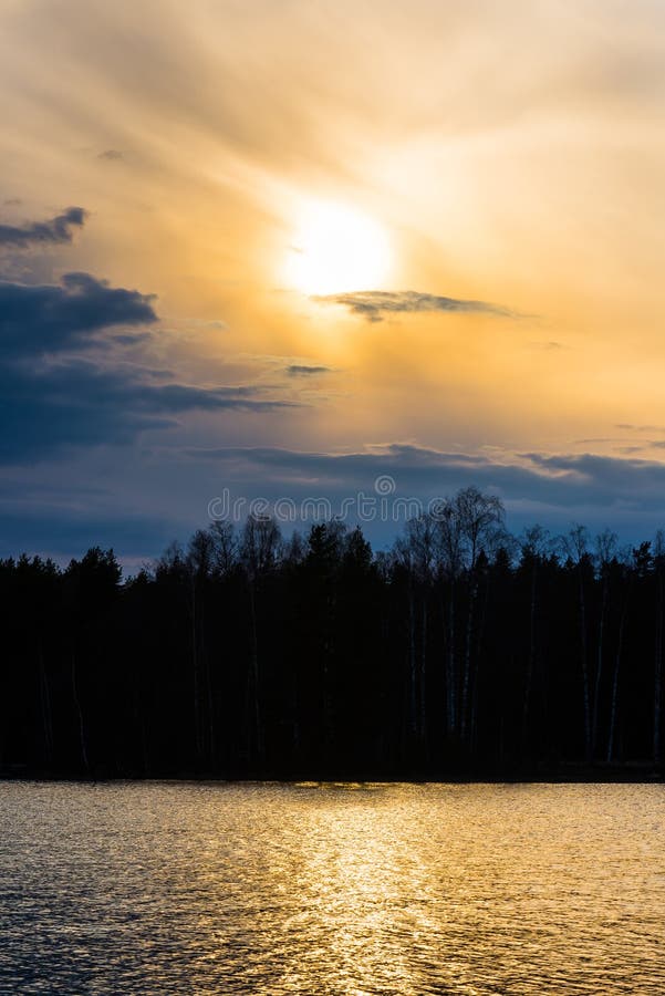Sunny spring evening stock image. Image of lake, yellow - 72955653