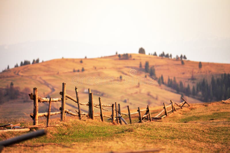 Sunny Spring Evening in Mountain Village. Fields and Hills Stock Photo ...