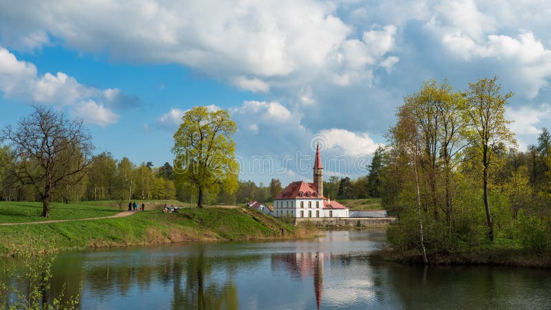 Sunny Spring Landscape with a Castle by the Water. Stock Photo - Image ...