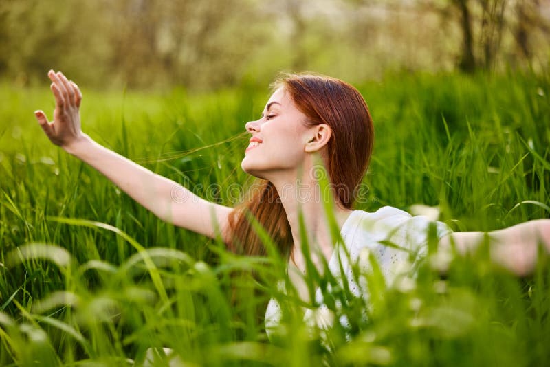 Sunny Summer Day A Beautiful Young Woman Lying On The Grass Stock