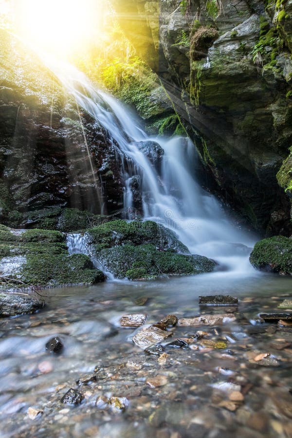 Sunny waterfall stock photo. Image of jungle, sunlight - 54574810