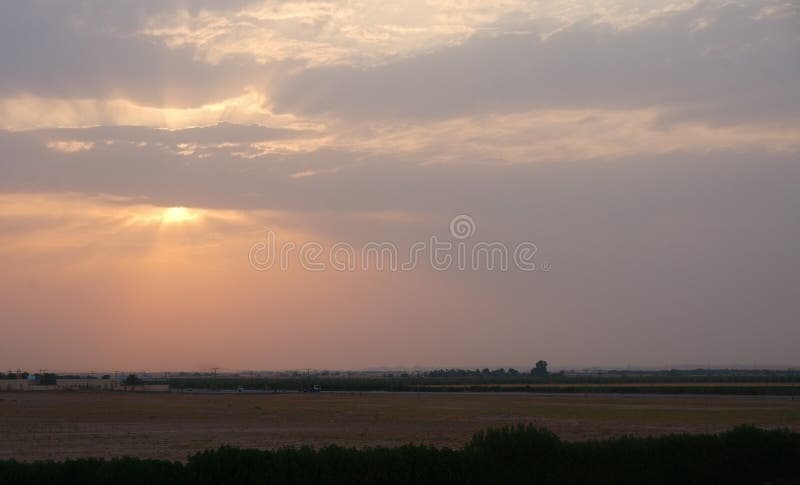 Sunray, Clouds, Horizon and Silhouette Stock Photo - Image of rays ...