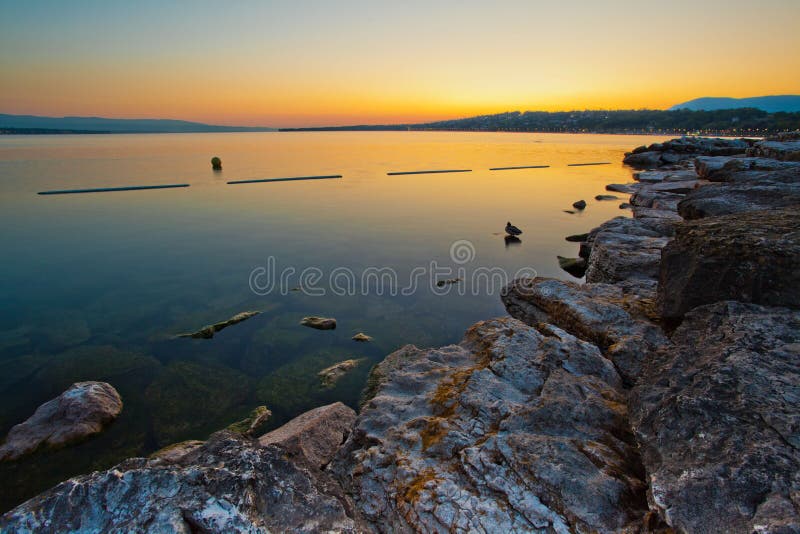 Sunrise stock photo. Image of dawn, rocks, pebbles, leman - 19382524