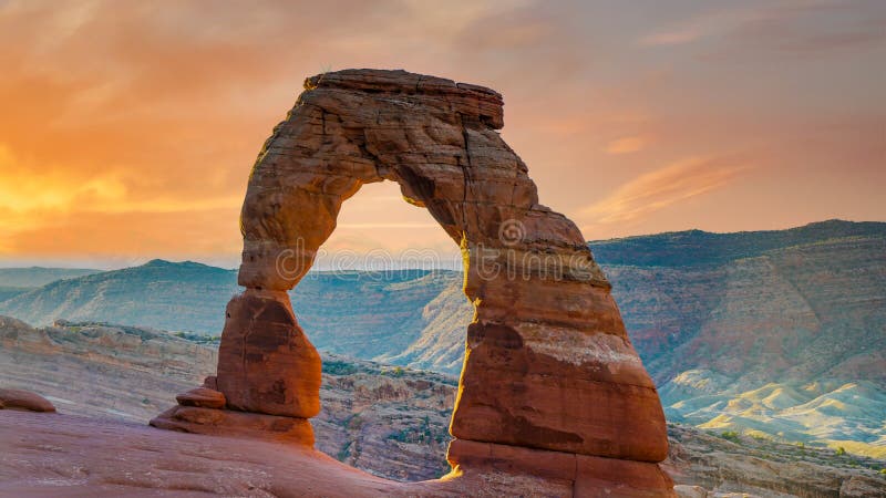 Sunrise at Delicate Arch stock photo. Image of arches - 265090376