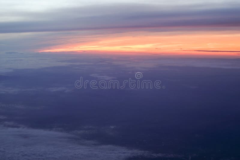 Sunrise above clouds stock image. Image of atmosphere - 158727737