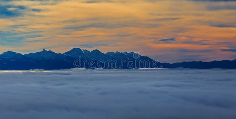 Sunrise Above the Clouds stock image. Image of cloudy - 51636015