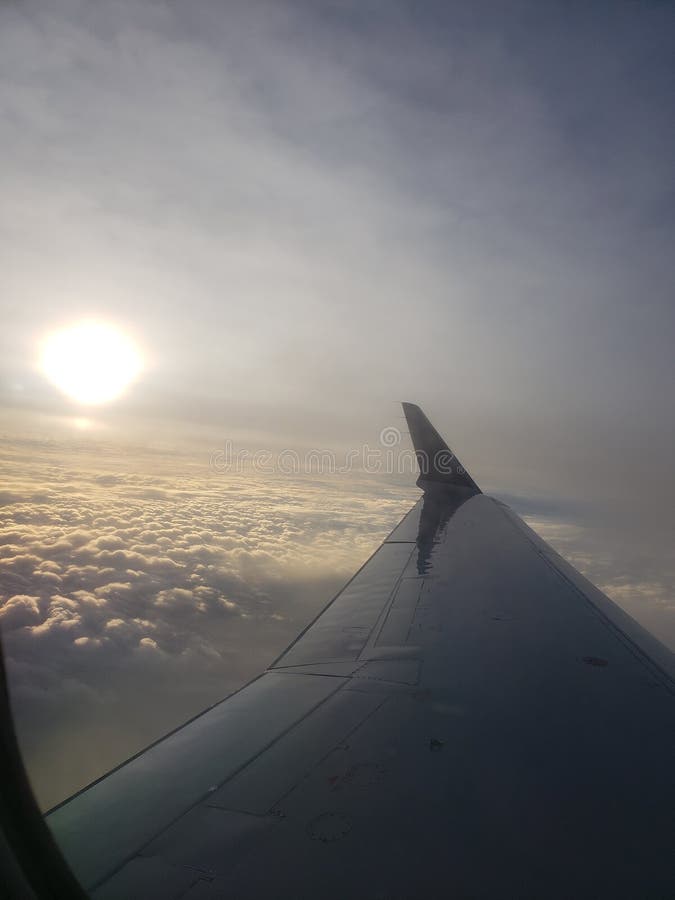 Sunrise above the clouds stock image. Image of clouds - 153243631