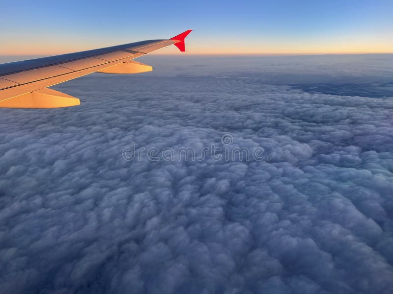 Sunrise above the clouds stock image. Image of puffy - 270064239
