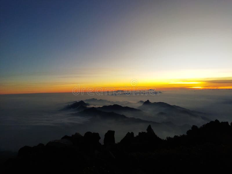 Sunset mt arjuna indonesia stock image. Image of dawn - 262449851
