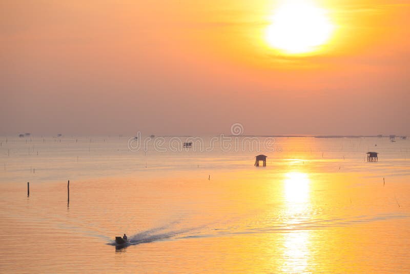 Sunset with fisherman boat stock image. Image of ocean - 19234683