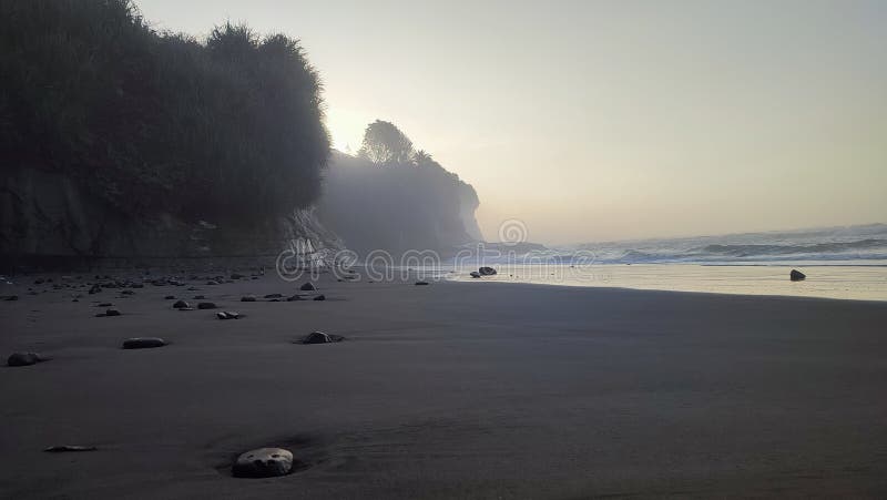 Sunrise on the Beach with Calm Waves and Cool Breeze Stock Image ...