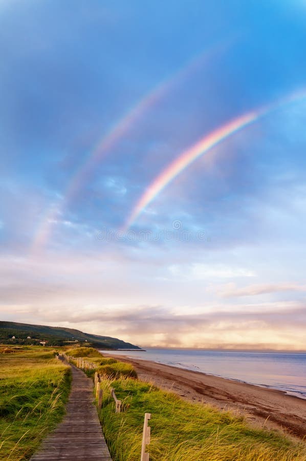 Rainbow over the Sea stock image. Image of beautiful - 115916237