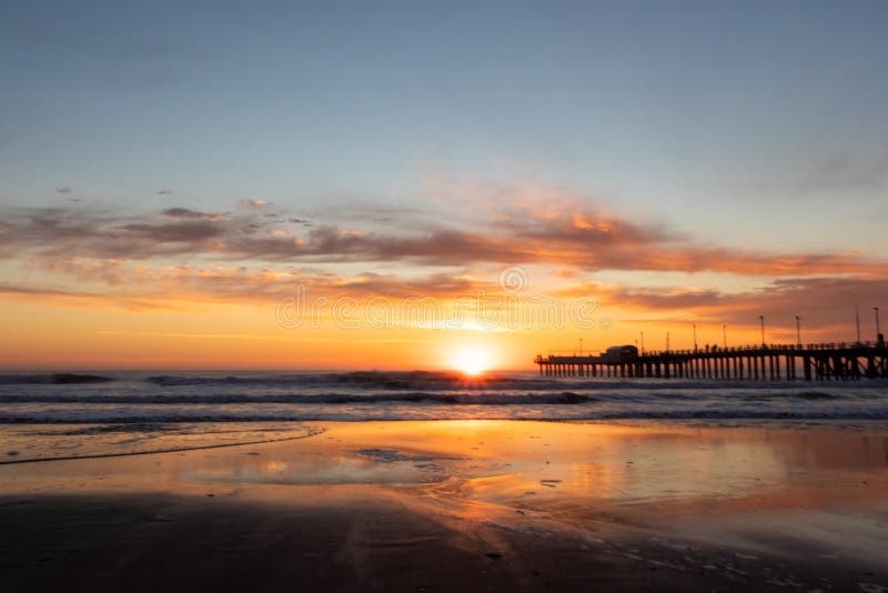 Sunrise on the beach stock photo. Image of landscape - 160278960