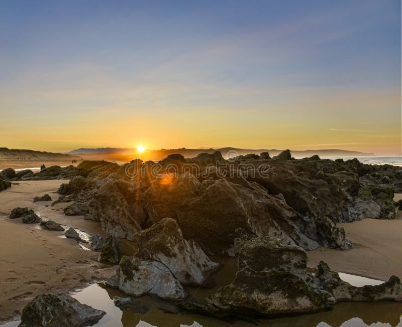 Sunrise on the beach stock photo. Image of sunset, reflex - 174110034