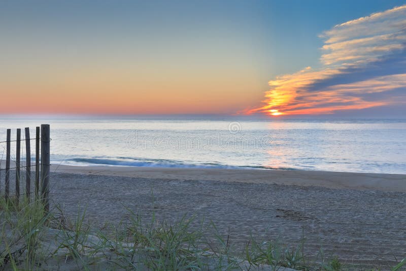 Sunrise at Bethany Beach, Deleware Stock Image - Image of surf, clouds ...