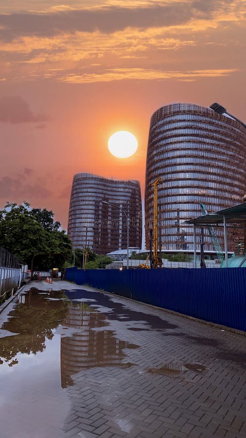 Sunrise within building stock photo. Image of cityvibes - 232132714