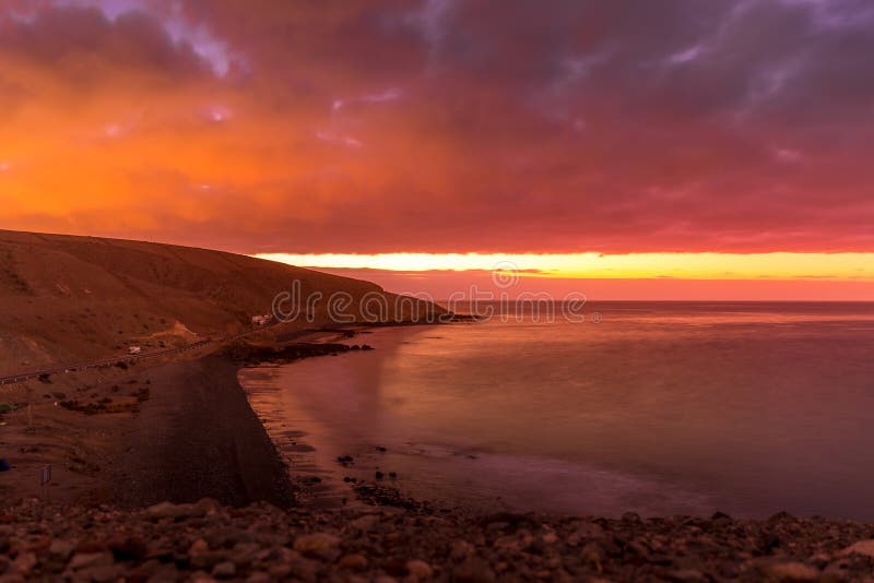 Sunrise from a Cliff with Moving Clouds in a Different Direction ...