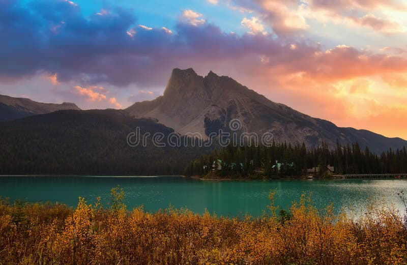 Sunrise Clouds Over Emerald Lake Stock Photo - Image of nature, plants ...