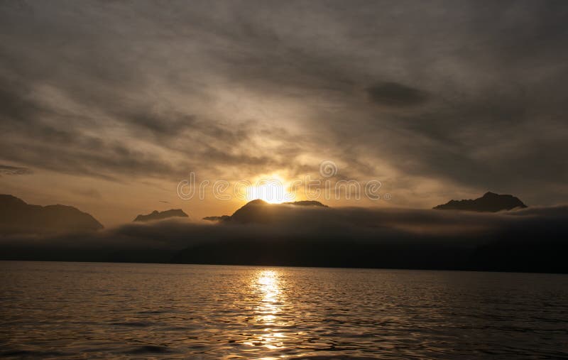 Sunrise Over the Mountains Near the Ocean in Alaska Stock Image - Image ...