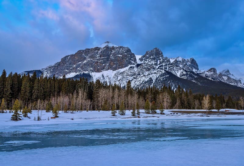 Sunrise Clouds Over Wintry Mountains at Quarry Lake Stock Image - Image ...