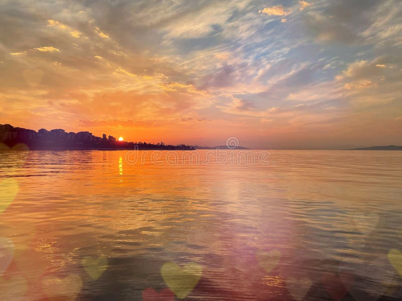 Sunrise, Dramatic Clouds and Reflections in the Sea Stock Image - Image ...