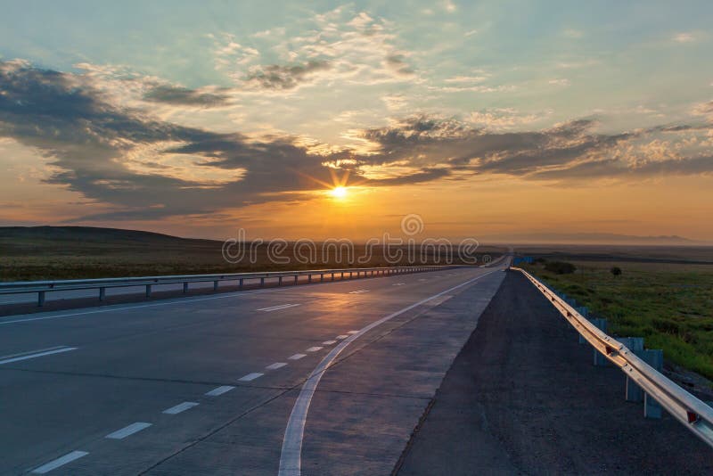 Sunrise on the highway stock photo. Image of country - 102417510
