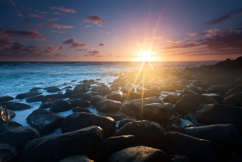 Sunset over Ocean Rocks stock photo. Image of reflection - 15728120