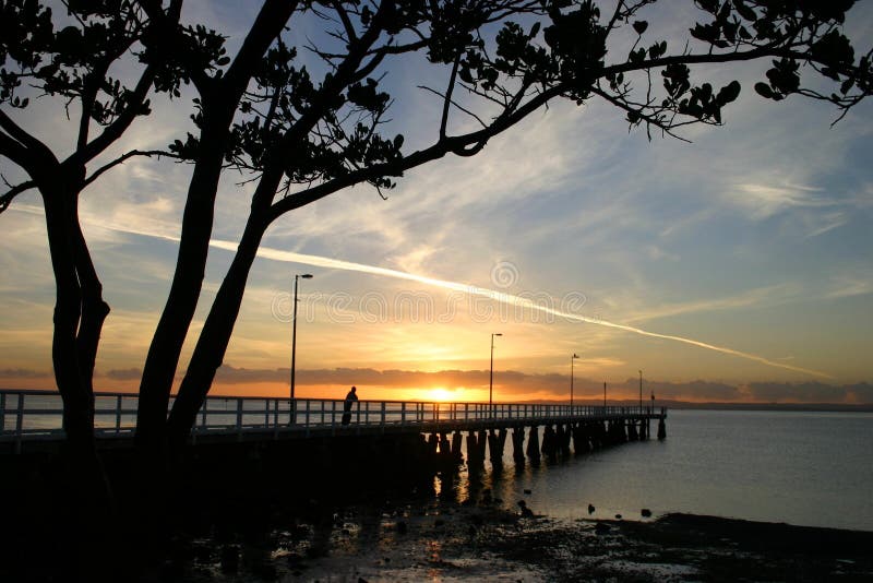 Sunrise at Jetty stock image. Image of morning, dawn, beach - 137375