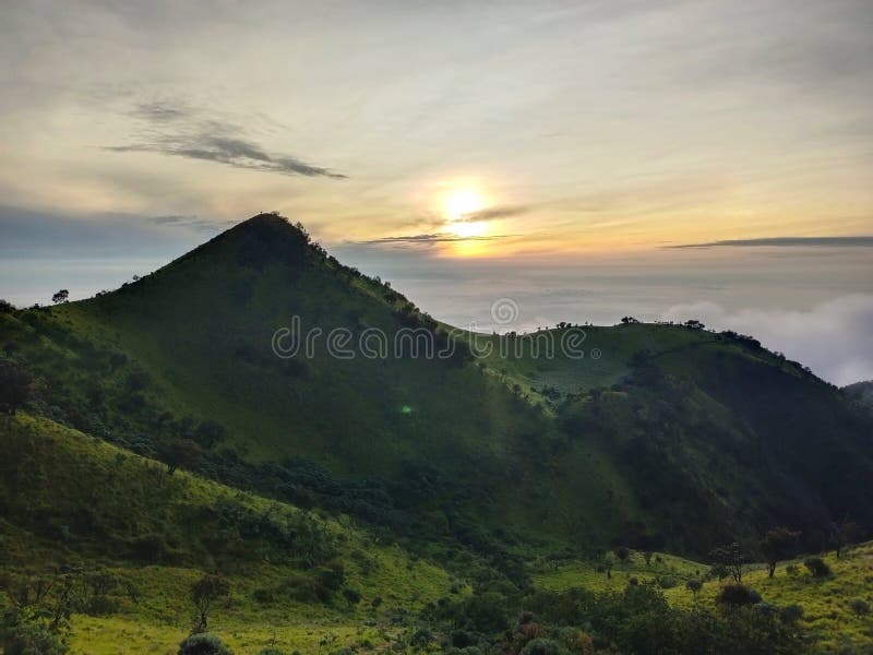 Sunrise at Lawu Mount stock photo. Image of mountain - 265645072