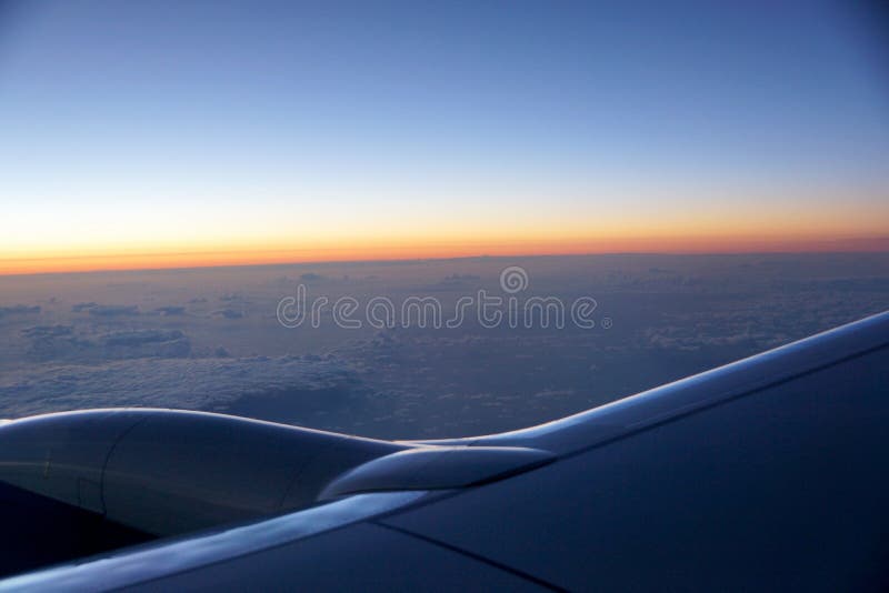 Sunrise Light Over the World Full of Clouds with Airplane Jet Wing ...