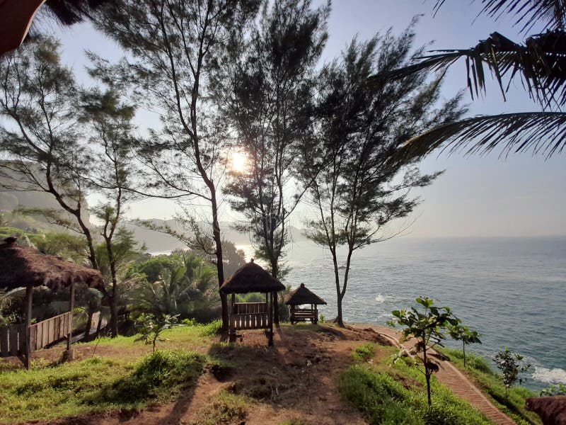 Sunrise on the Menganti Beach Stock Photo - Image of hill, cloud: 248821480