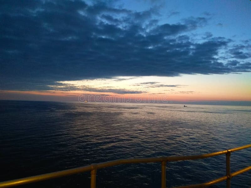 The Clouds in the Middle of Sea. Stock Image - Image of gull, rays ...