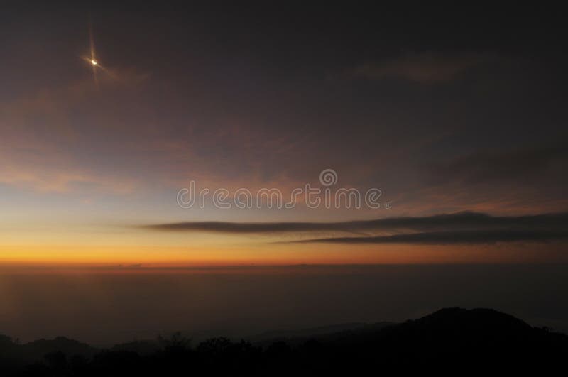 Sunrise and Moon Falls on the Mountains. Stock Photo - Image of sunrise ...