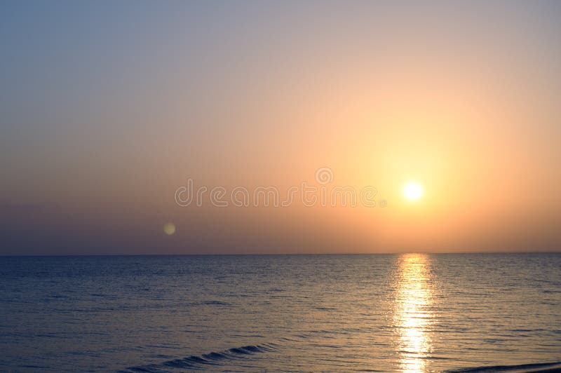 Sunrise, moonset stock image. Image of shore, light, beach - 5177355