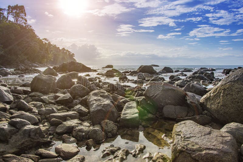 Sunrise in Morning and Flare Rock on the Beach Stock Image - Image of ...