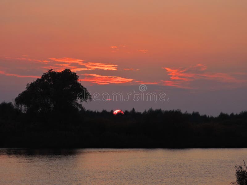 Sunrise near a river stock photo. Image of tower, water - 185516148