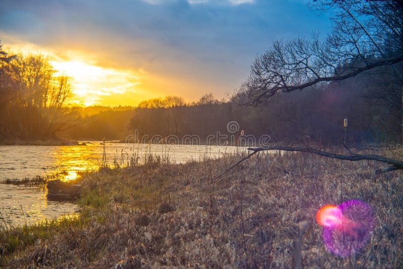 Sunrise Near River in Spring Stock Image - Image of outdoor, lens ...