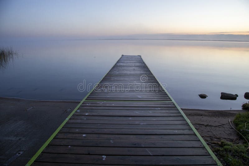 Sunrise Northern Lake Dock stock image. Image of blue - 205920935