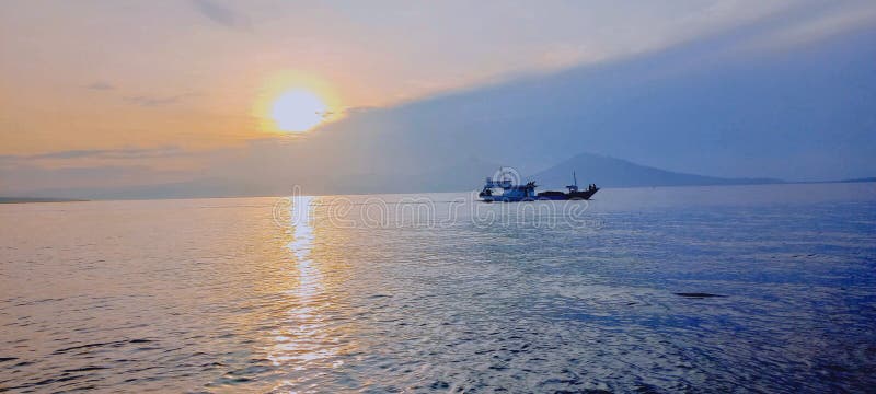 Sunrise, Ocean and the Fisherman Ship in the Morning Stock Photo ...