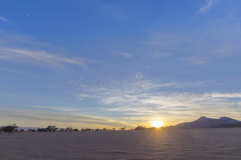 Sunrise Over Barren Sandy Area Stock Image - Image of panoramic, cloud ...