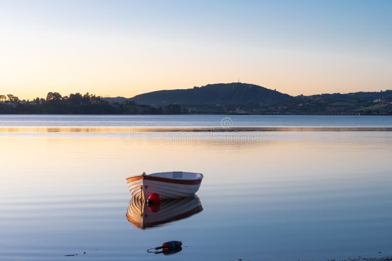 Sunrise Over Bay with Back-lit Dingy Stock Image - Image of hour ...